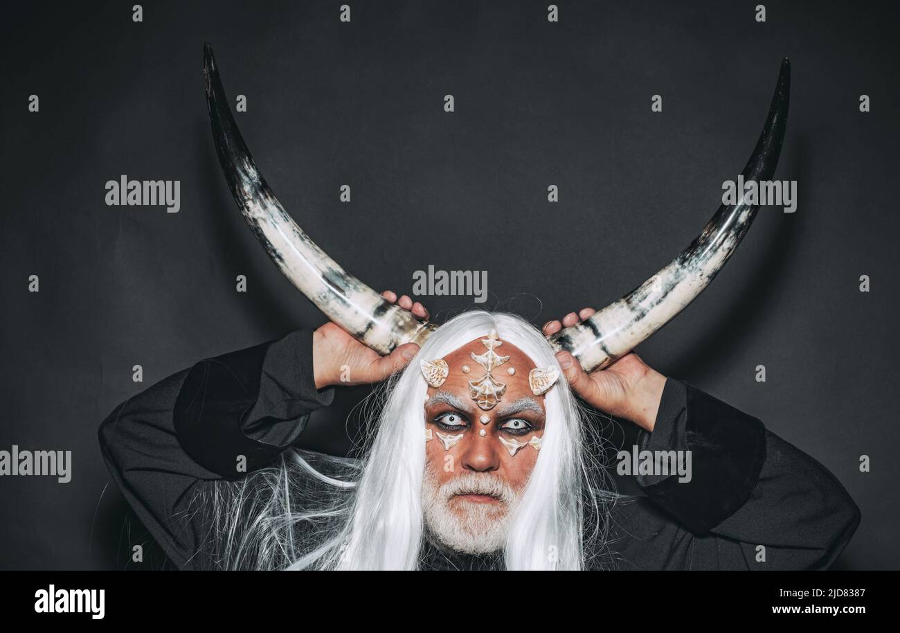 Wizard demon man with dragon skin and horns. Tree spirit and fantasy ...