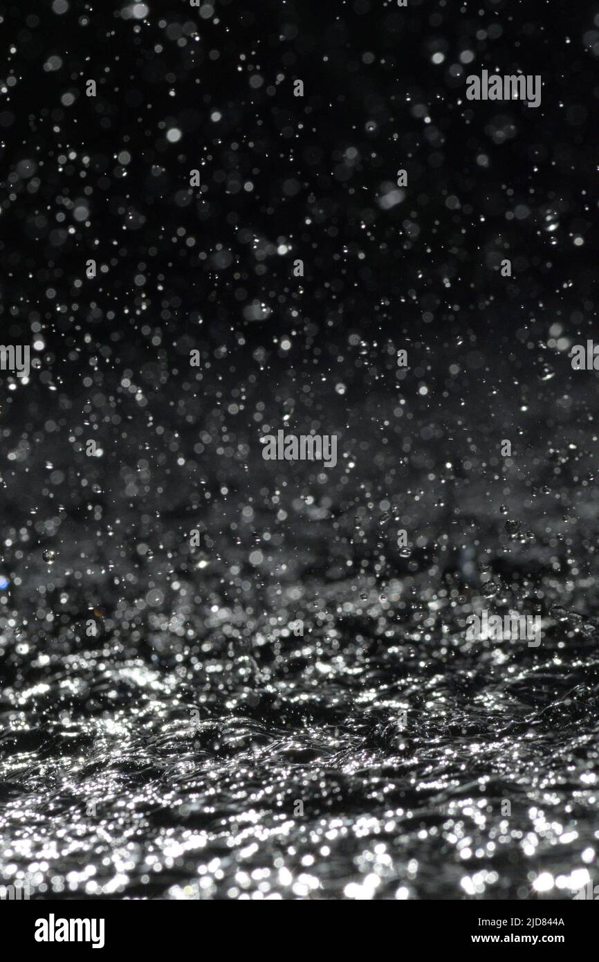 Water drops splashing and jumping with force Stock Photo - Alamy