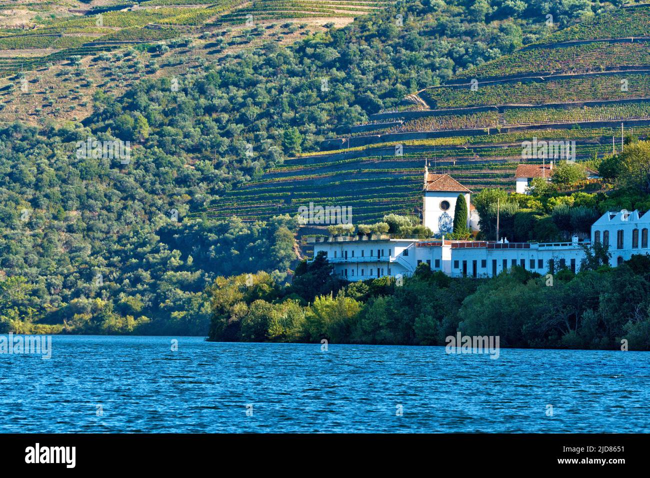 old quinta and Port wine vineyard on the hills in the Douro Valley near ...