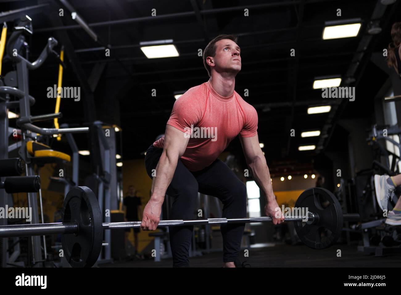 Bodybuilder lifting heavy barbell hi-res stock photography and images ...
