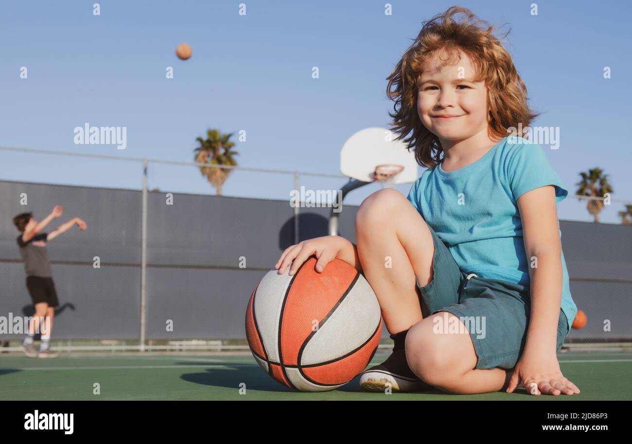Healthy children lifestyle. Kids little boy playing basketball. Child ...