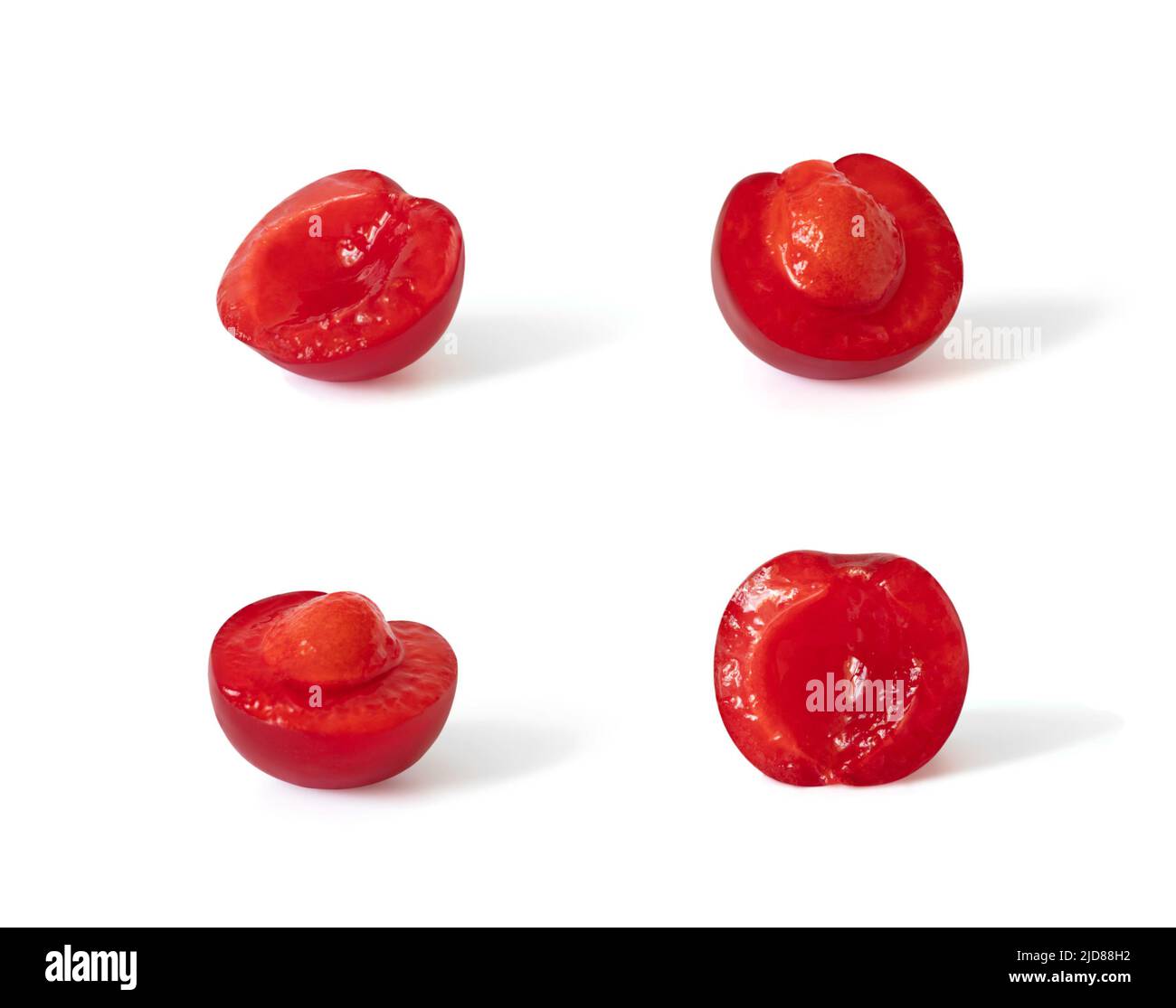 Set of sliced cherries isolated on a white background Stock Photo - Alamy