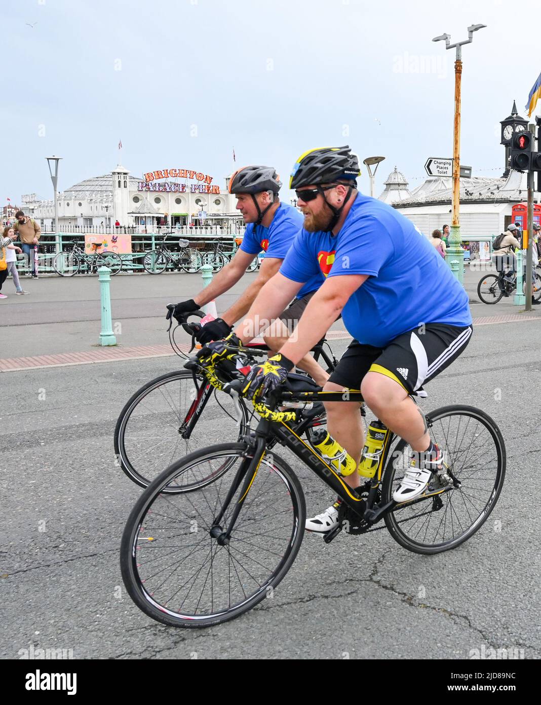 Brighton UK 19th June 2022 - Cyclists near the finish after taking part ...