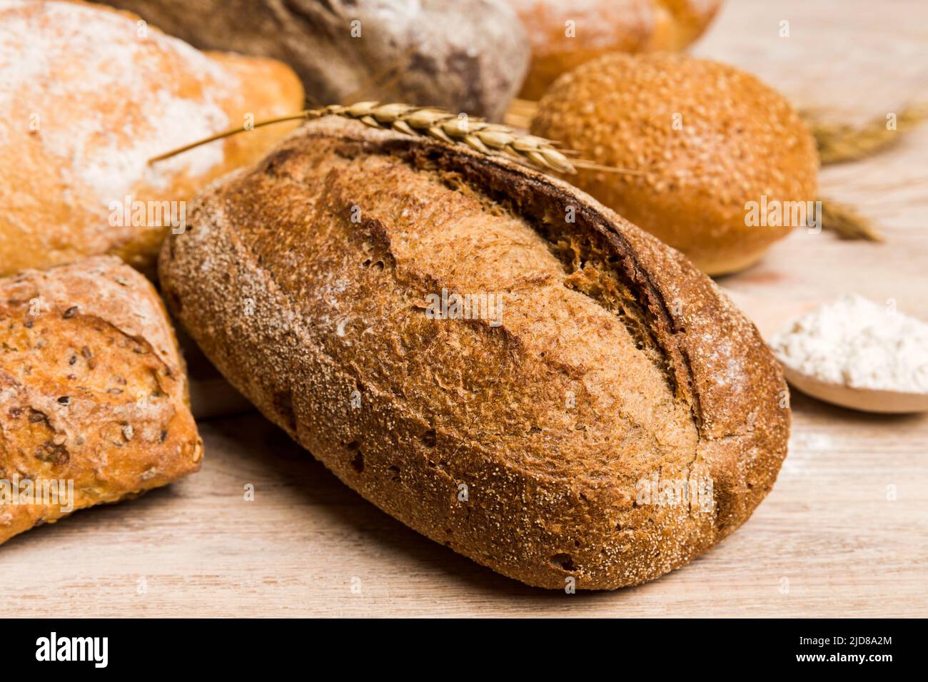 Homemade natural breads. Different kinds of fresh bread as background ...