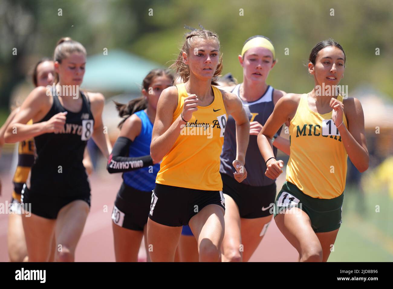 Dalia Frias of Mira Costa (right) and Sam McDonnell of Newbury Park lead the girls 1,600m during ...