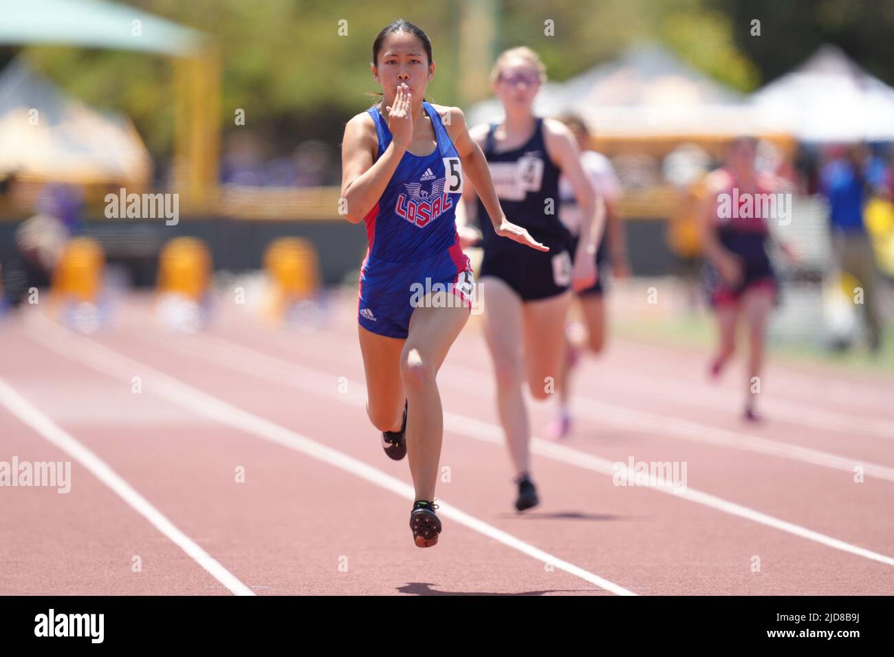 Kaylie Nguyen of Los Alamitos wins the Unified girls 100m in a wind ...
