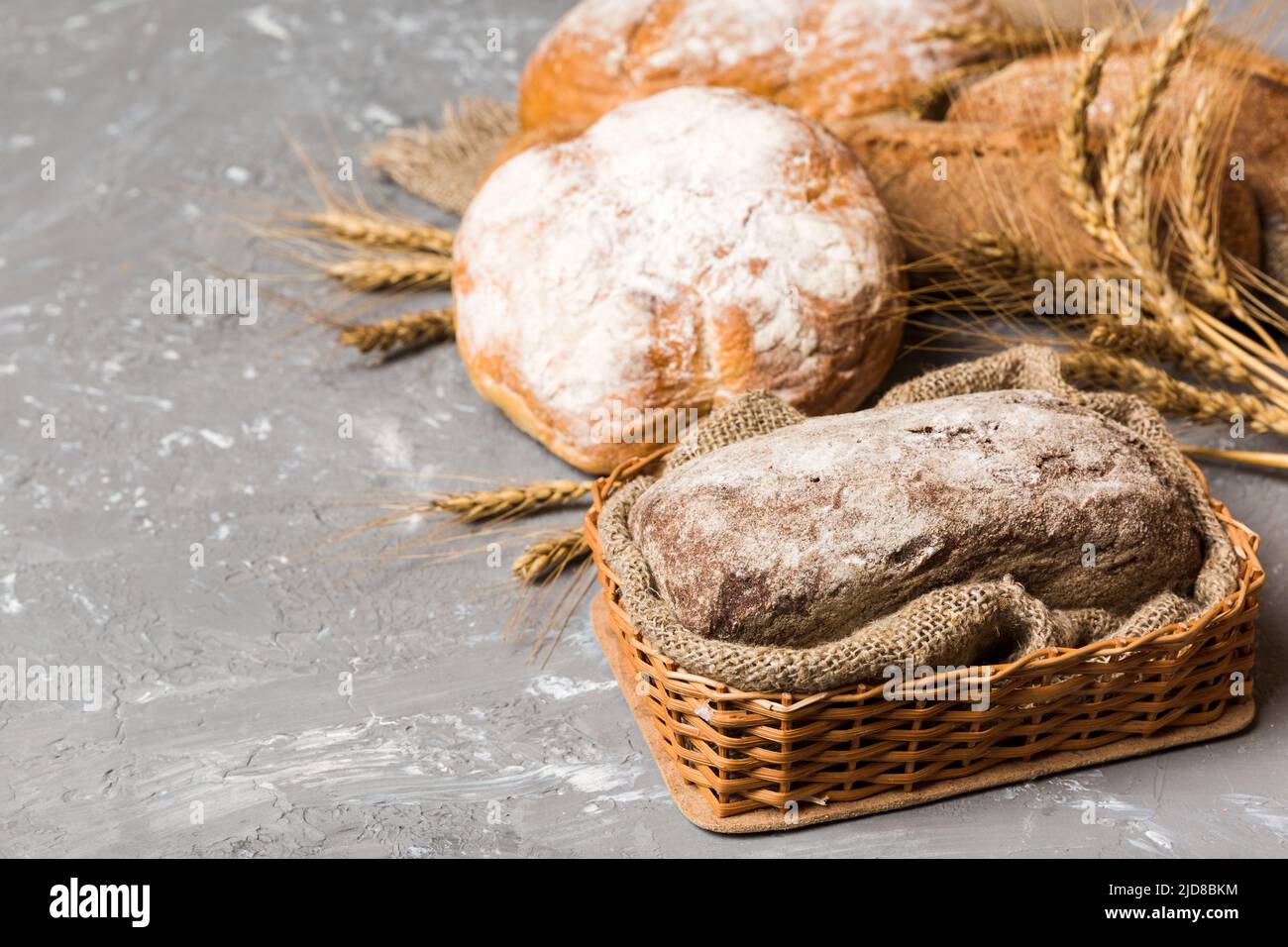 Homemade natural breads. Different kinds of fresh bread as background ...