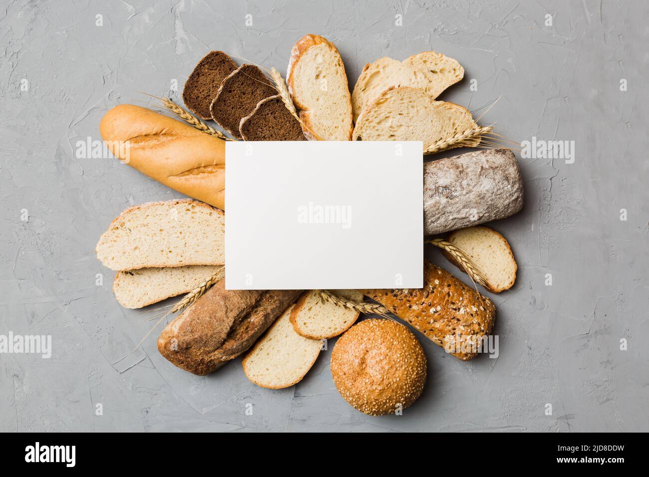 Minimalist paper blank mockup on background of Types of homemade bread ...
