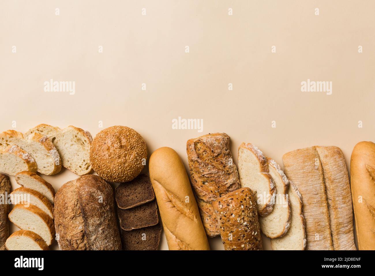 Homemade natural breads. Different kinds of fresh bread as background ...