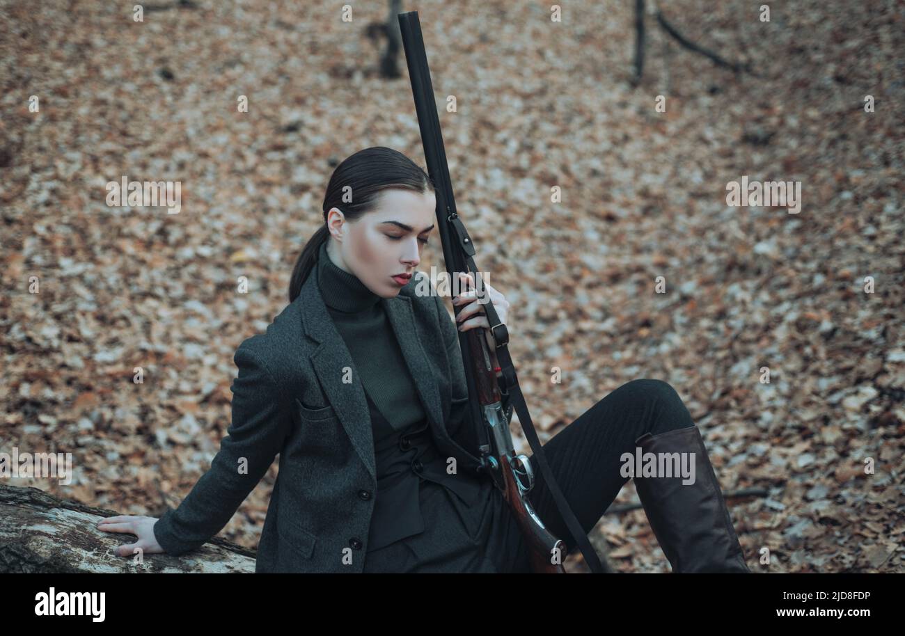 military fashion. achievements of goals. female hunter in forest ...