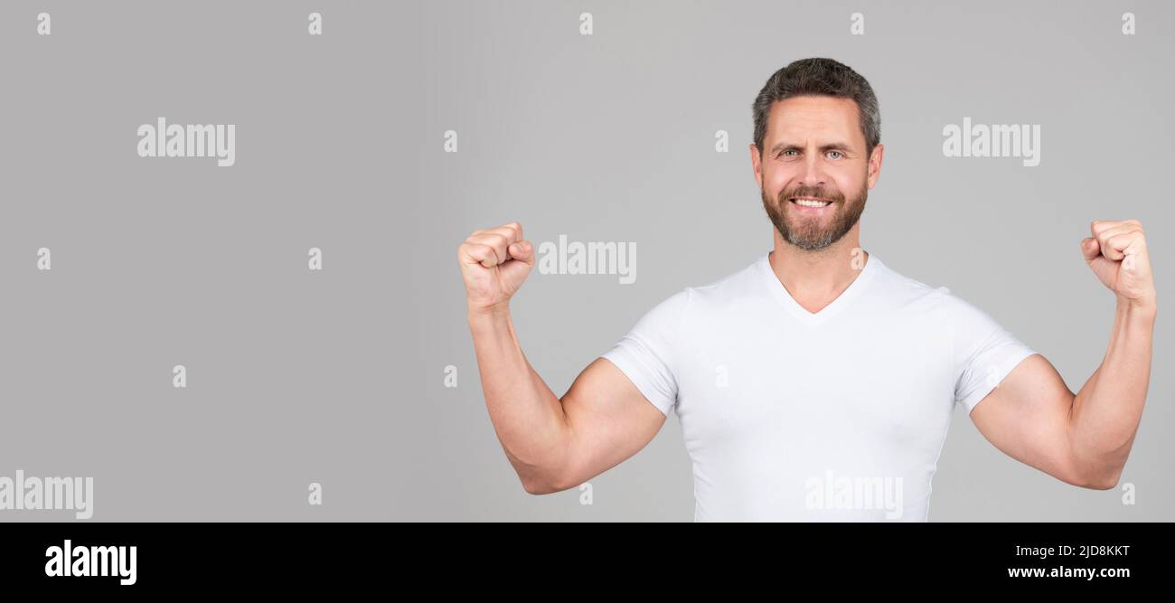 I am strong. Strong man grey background. Fit guy show strength. Muscle ...