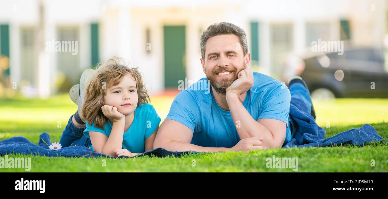 Banner of father and son in summer park outdoor. cheerful father with ...