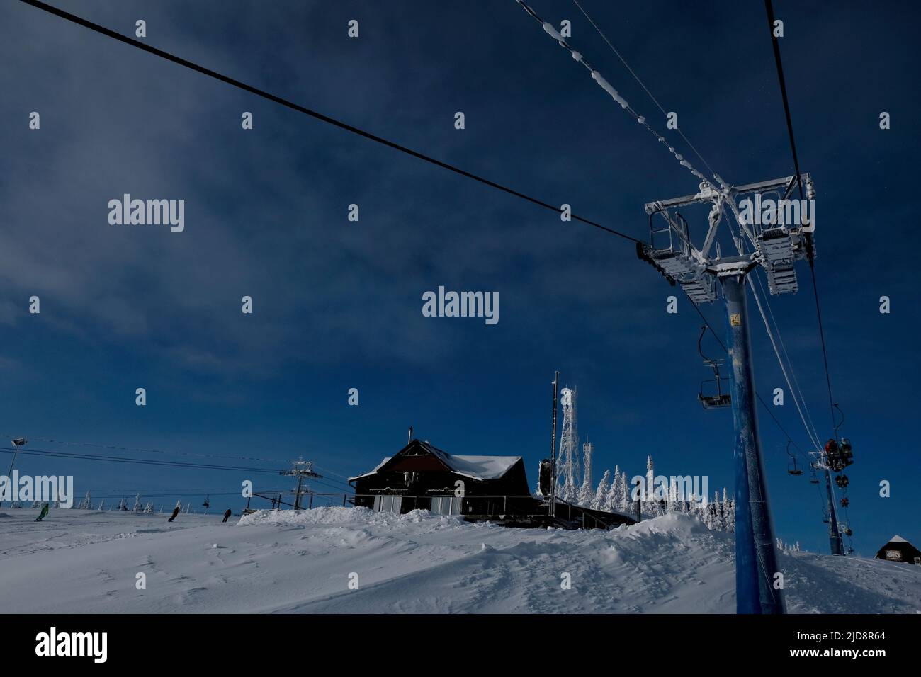 a sunny winter morning in the mountains of sheregesh on the ski track ...