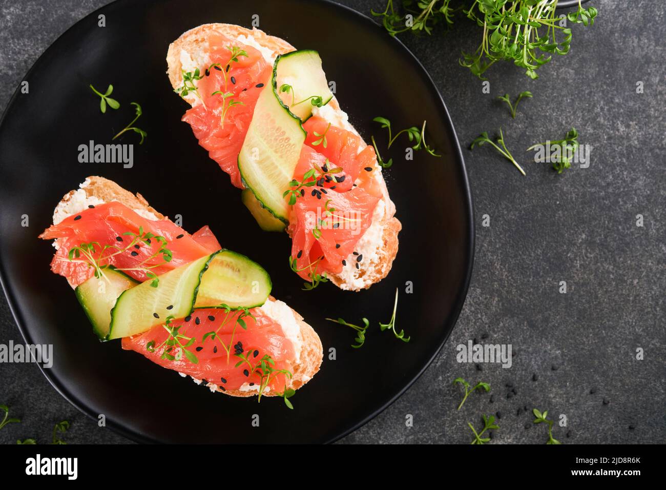 Sandwiches. Salmon toast with cream cheese, cucumber, black sesame and ...