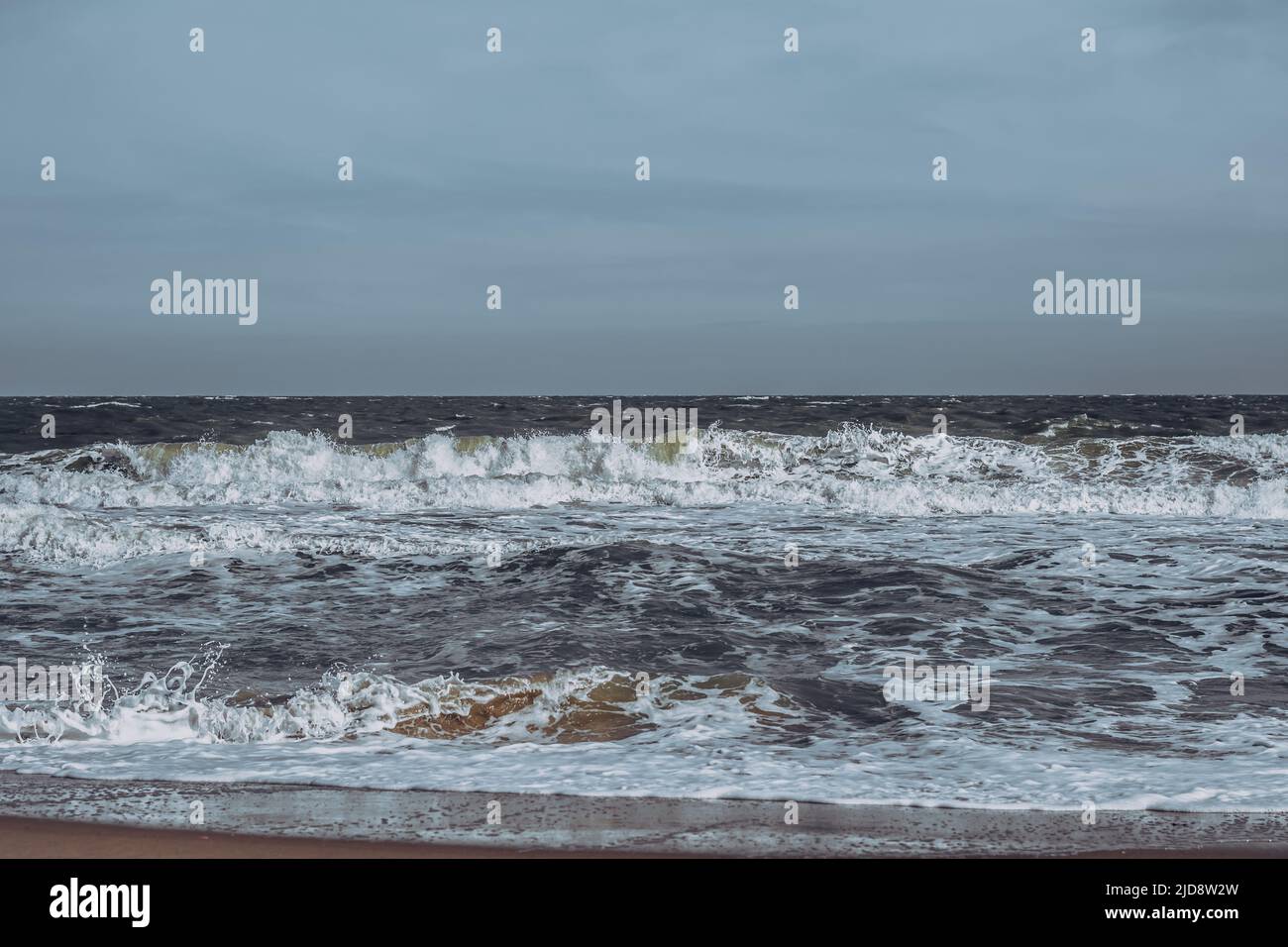 Ocean storm waves dramatically crashing splashing. Sky horizon line ...