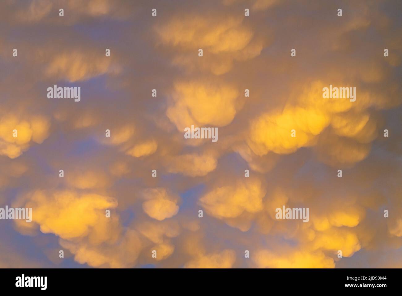 Cumulus and Stratus clouds in dramatic sunset sky over Cape Town South ...