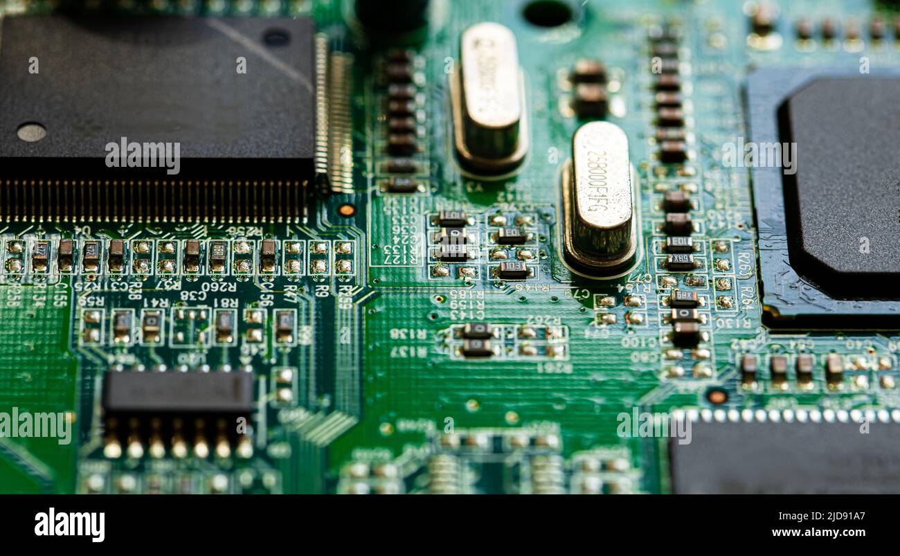 Macro Close up of components and microchips on PC circuit board of ...