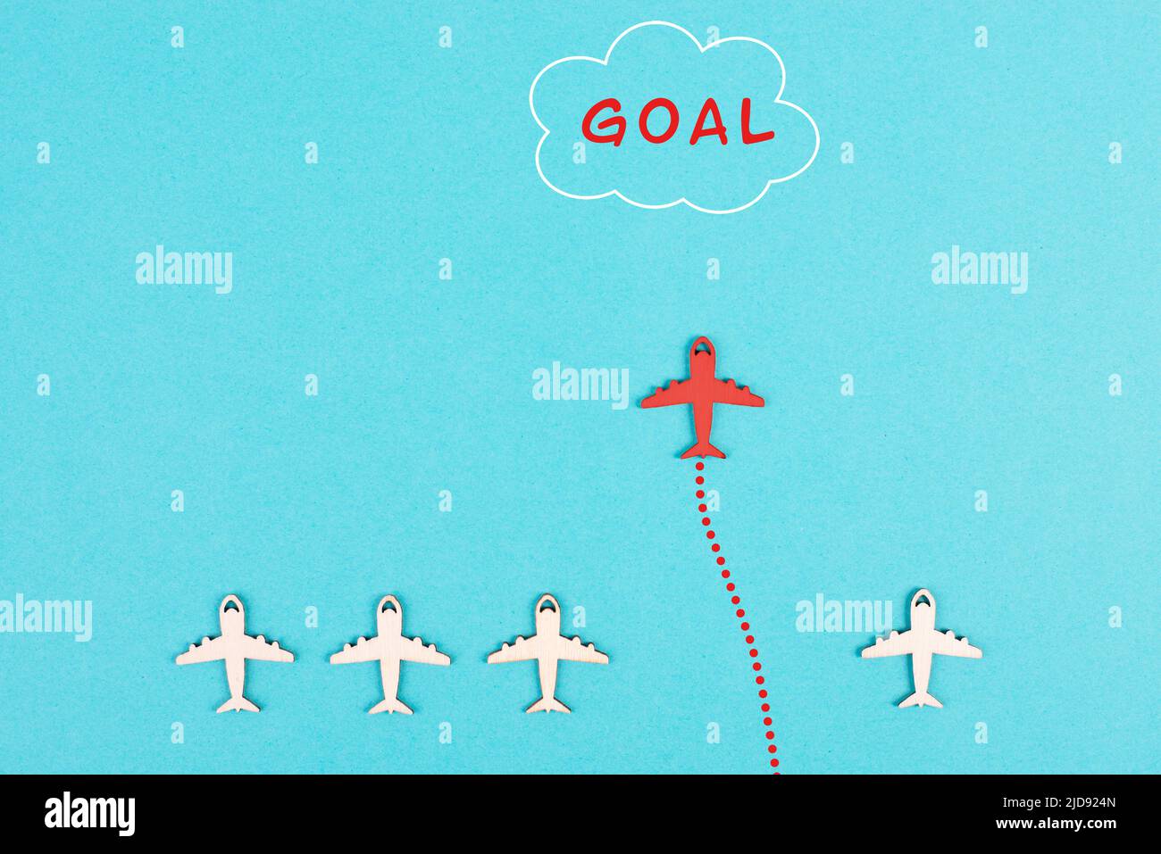 Red airplane is flying to his goal, leadership, courage and winner ...