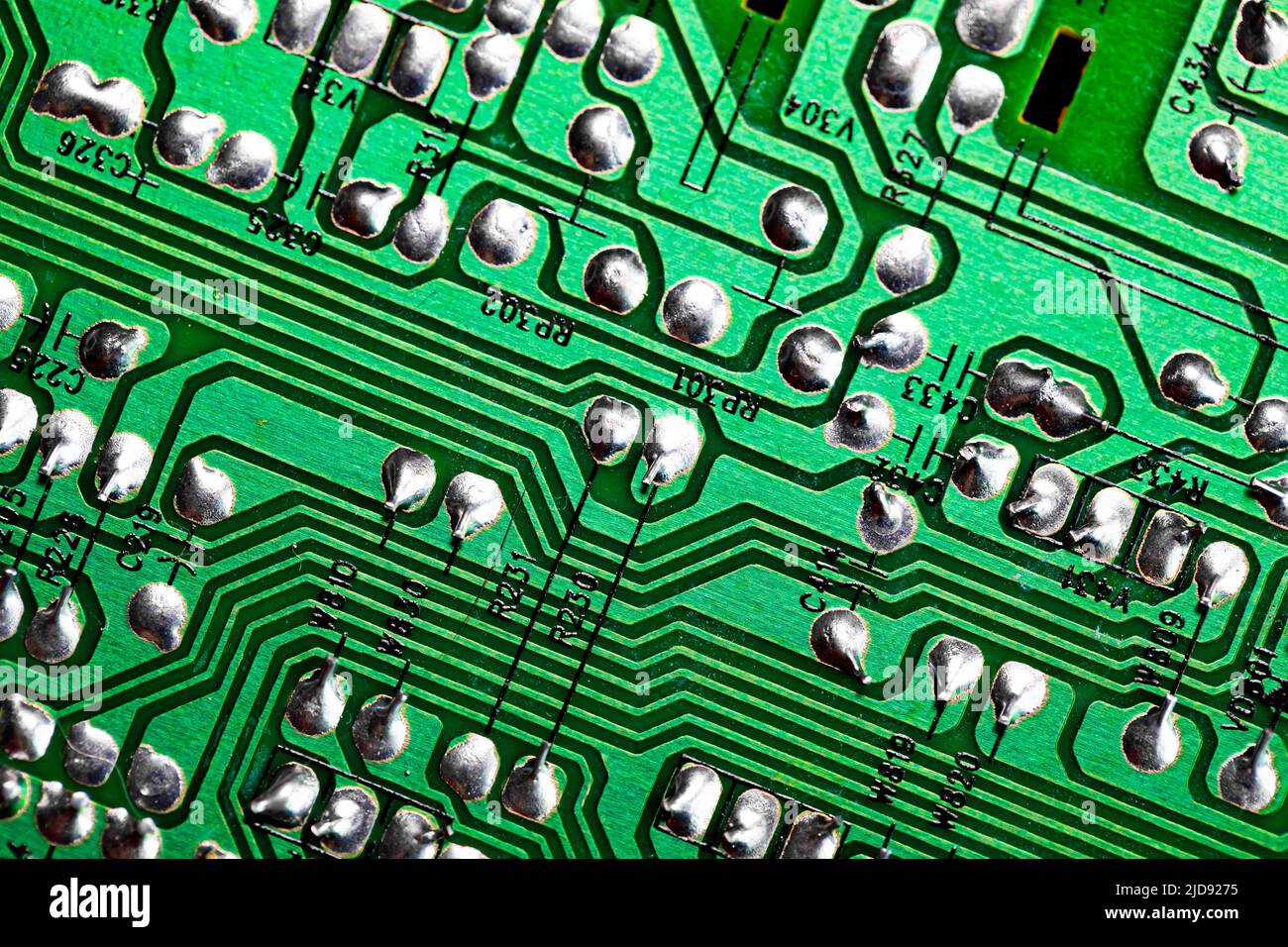 Macro Close up of printed wiring on old green PC circuit board Stock ...