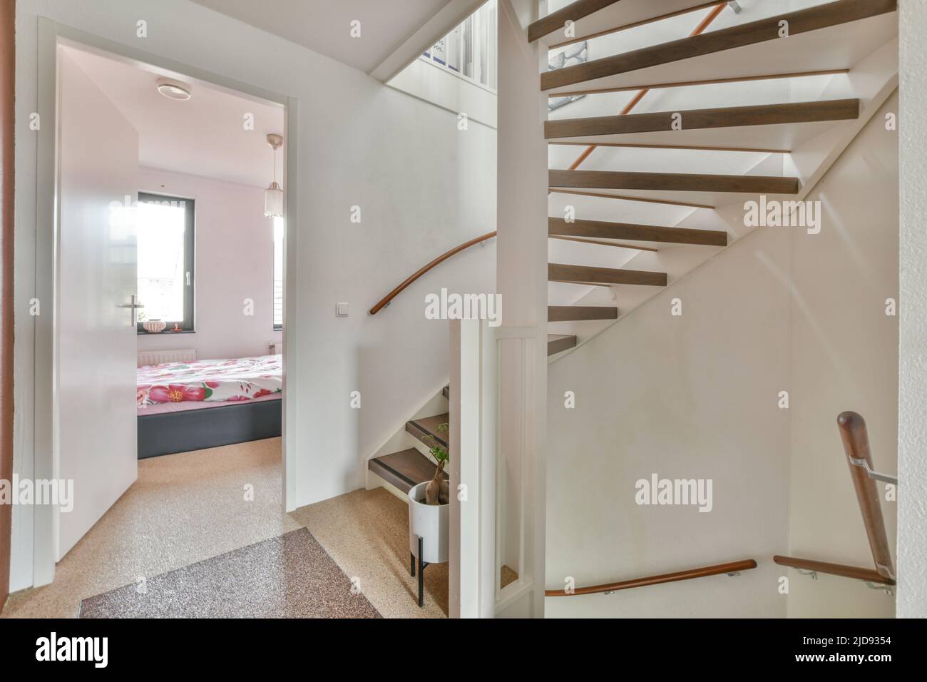 Spacious wooden stairway with comfortable steps Stock Photo - Alamy