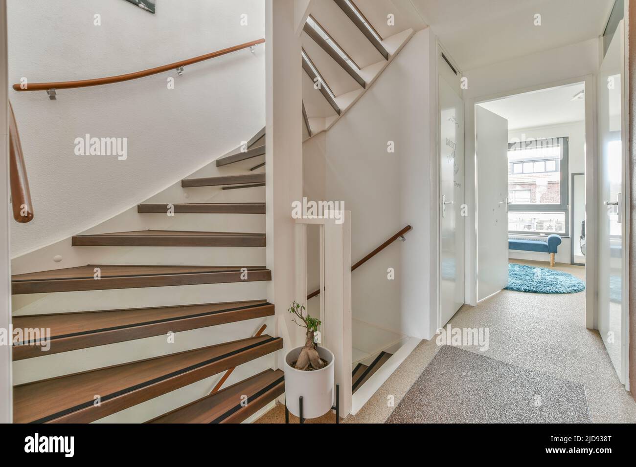 Spacious wooden stairway with comfortable steps Stock Photo - Alamy