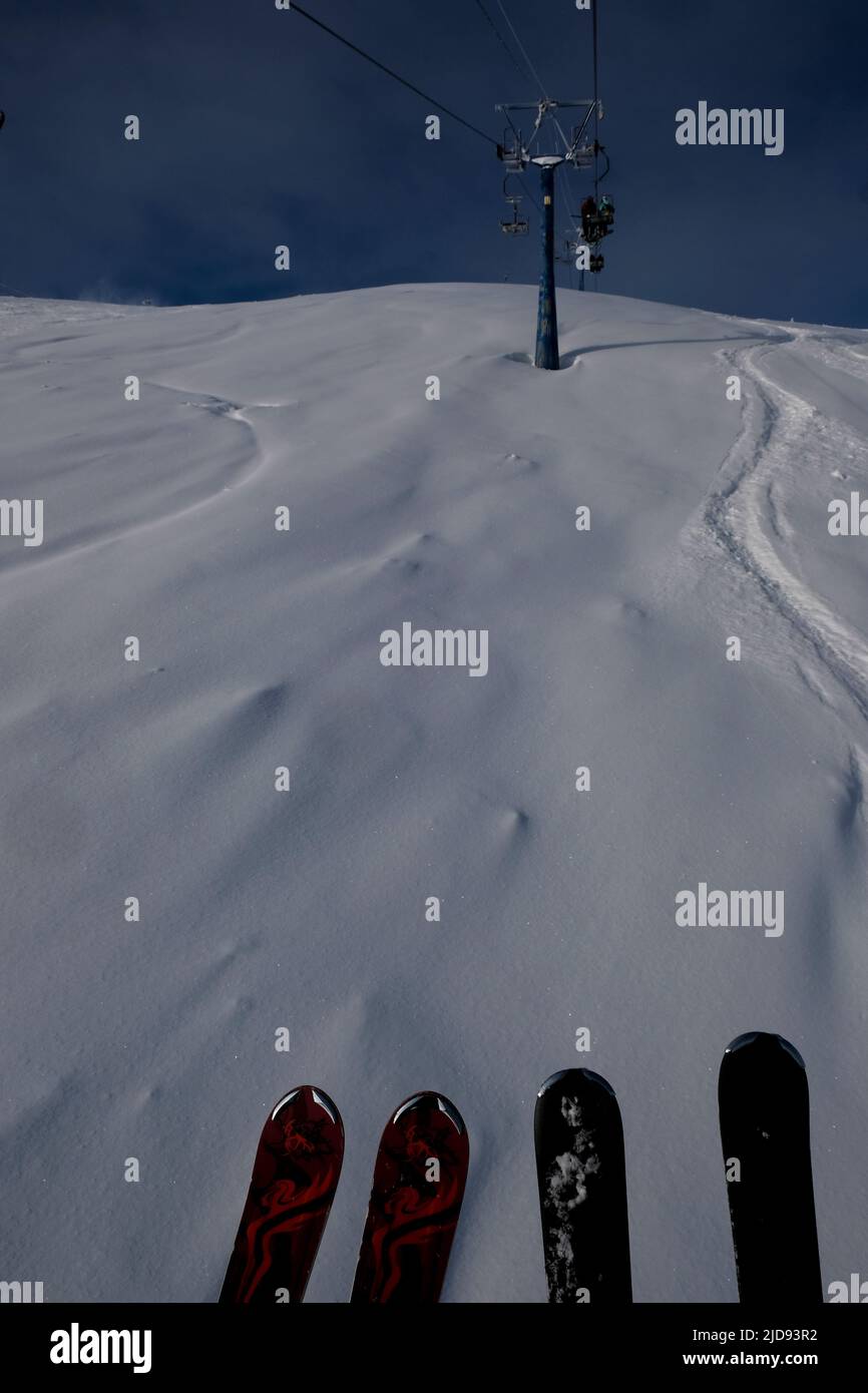 a sunny winter morning in the mountains of sheregesh on the ski track ...