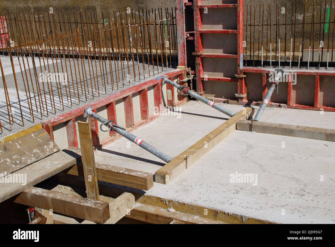 Formwork for a concrete wall was secured against slipping with struts ...