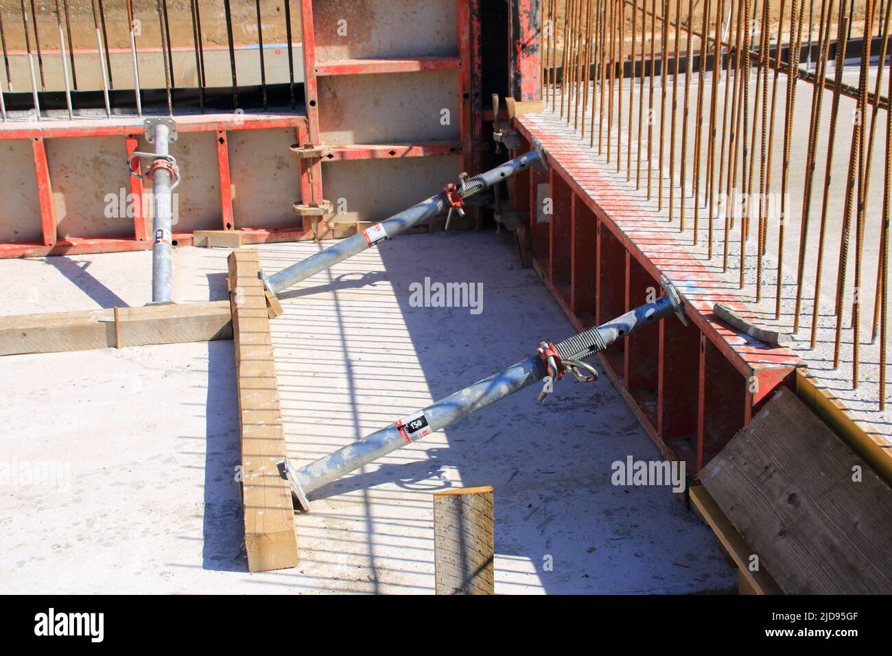Formwork for a concrete wall was secured against slipping with struts ...
