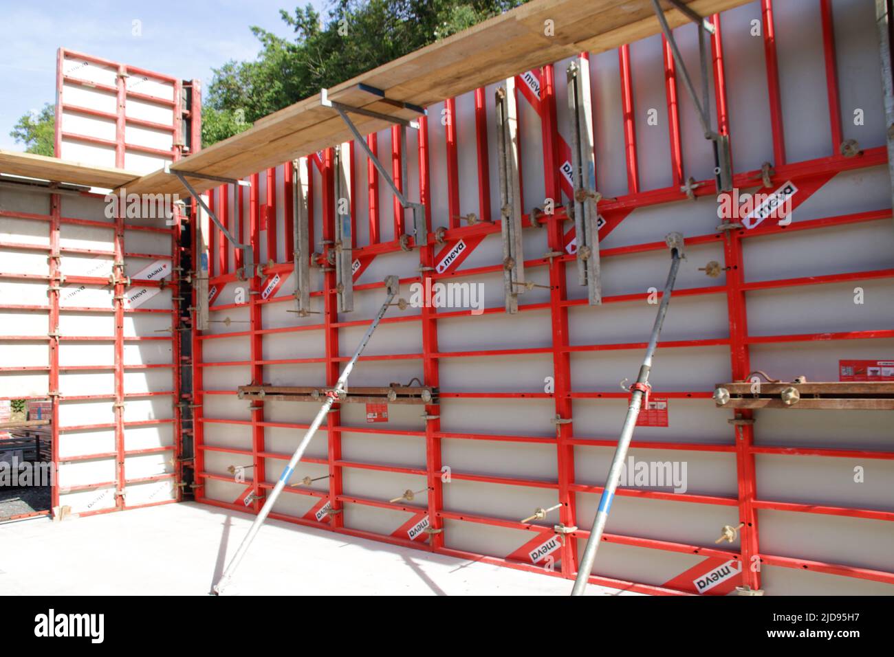 Formwork for a concrete wall was secured against slipping with struts ...