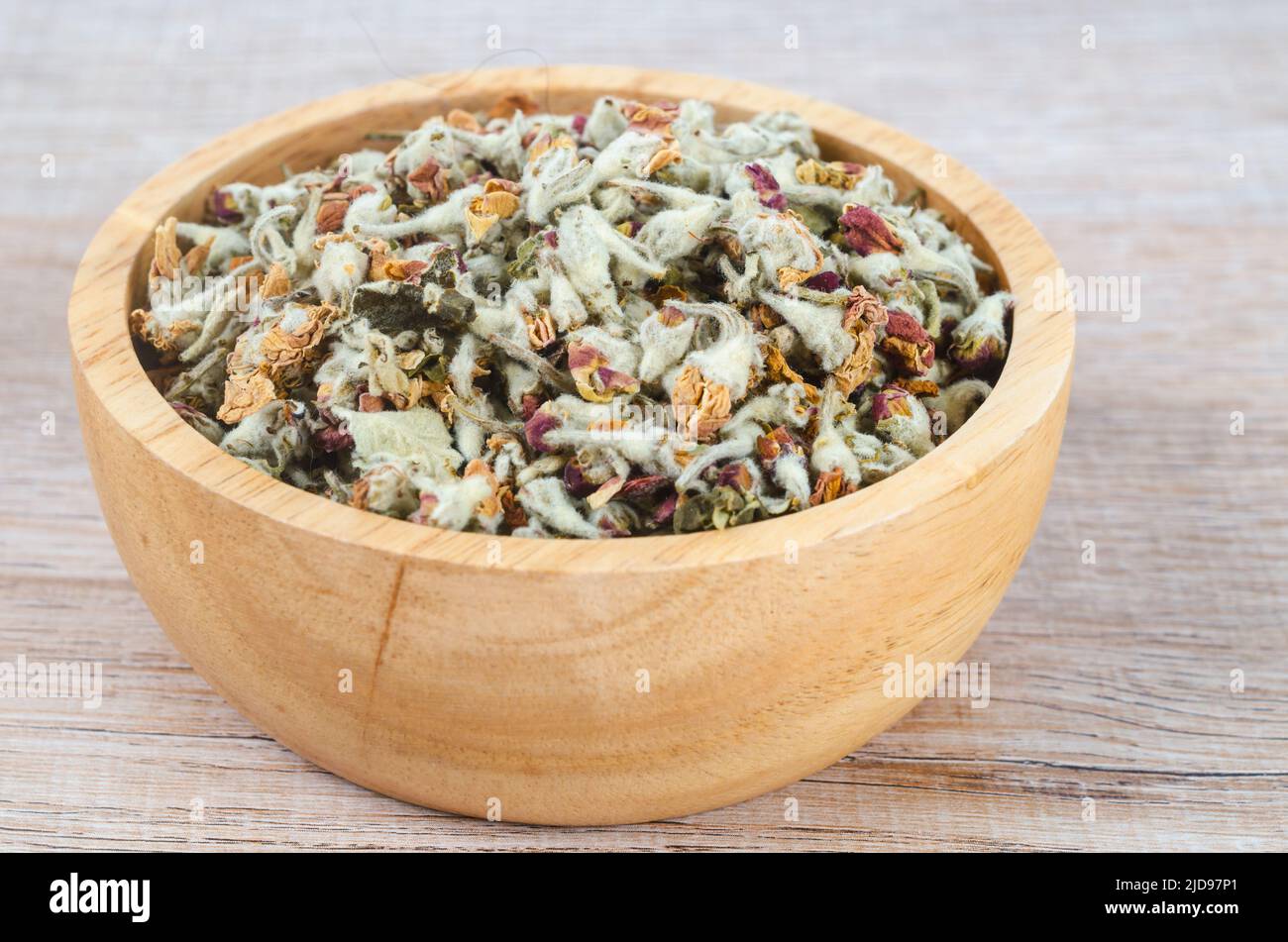 The Flower tea. Dried of apple blossom in wooden bowl Stock Photo - Alamy