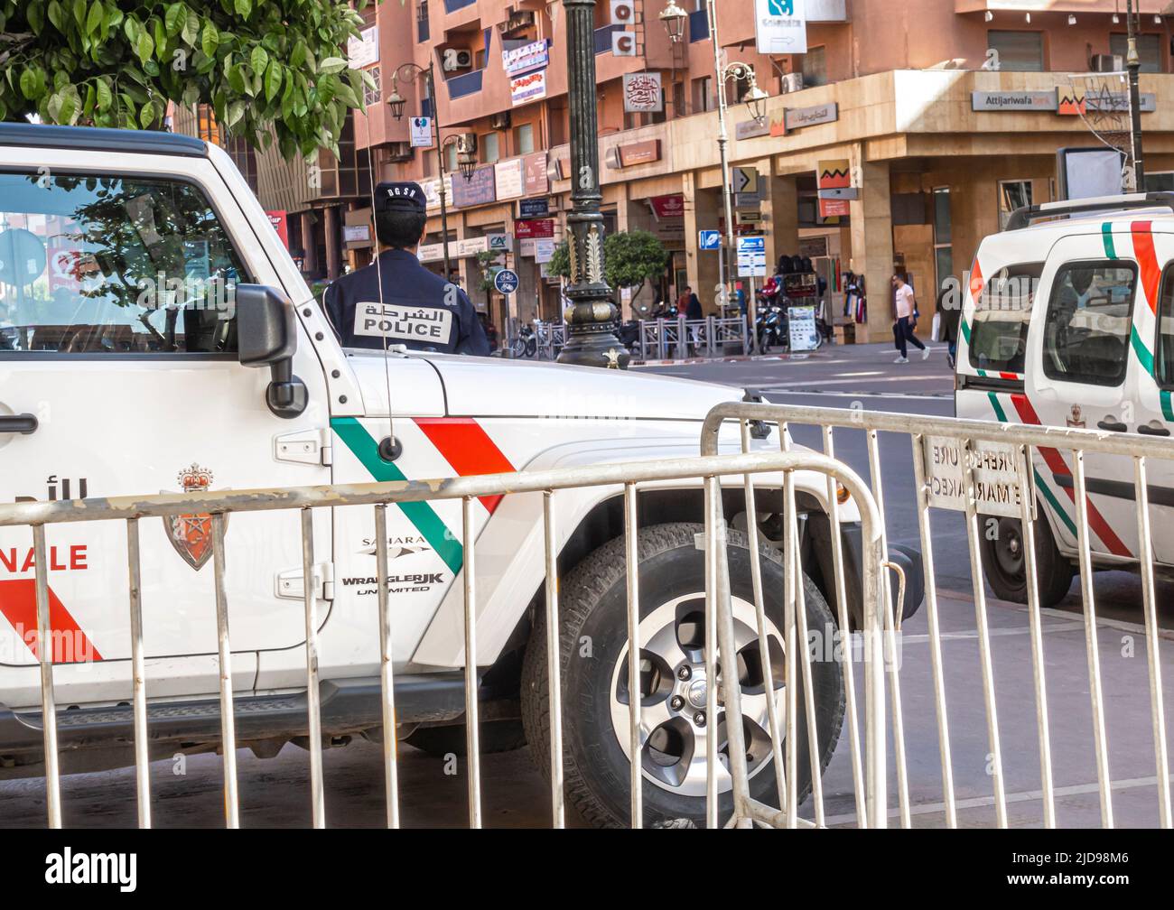 Police vans on patrol in central Marrakech, Morocco Stock Photo - Alamy