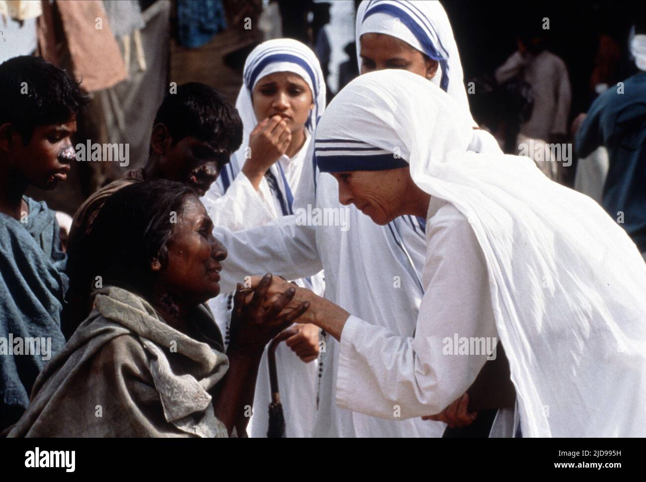 Mother Teresa Helping The Poor