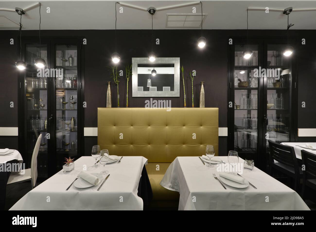 Dining room of a restaurant with table service set Stock Photo - Alamy