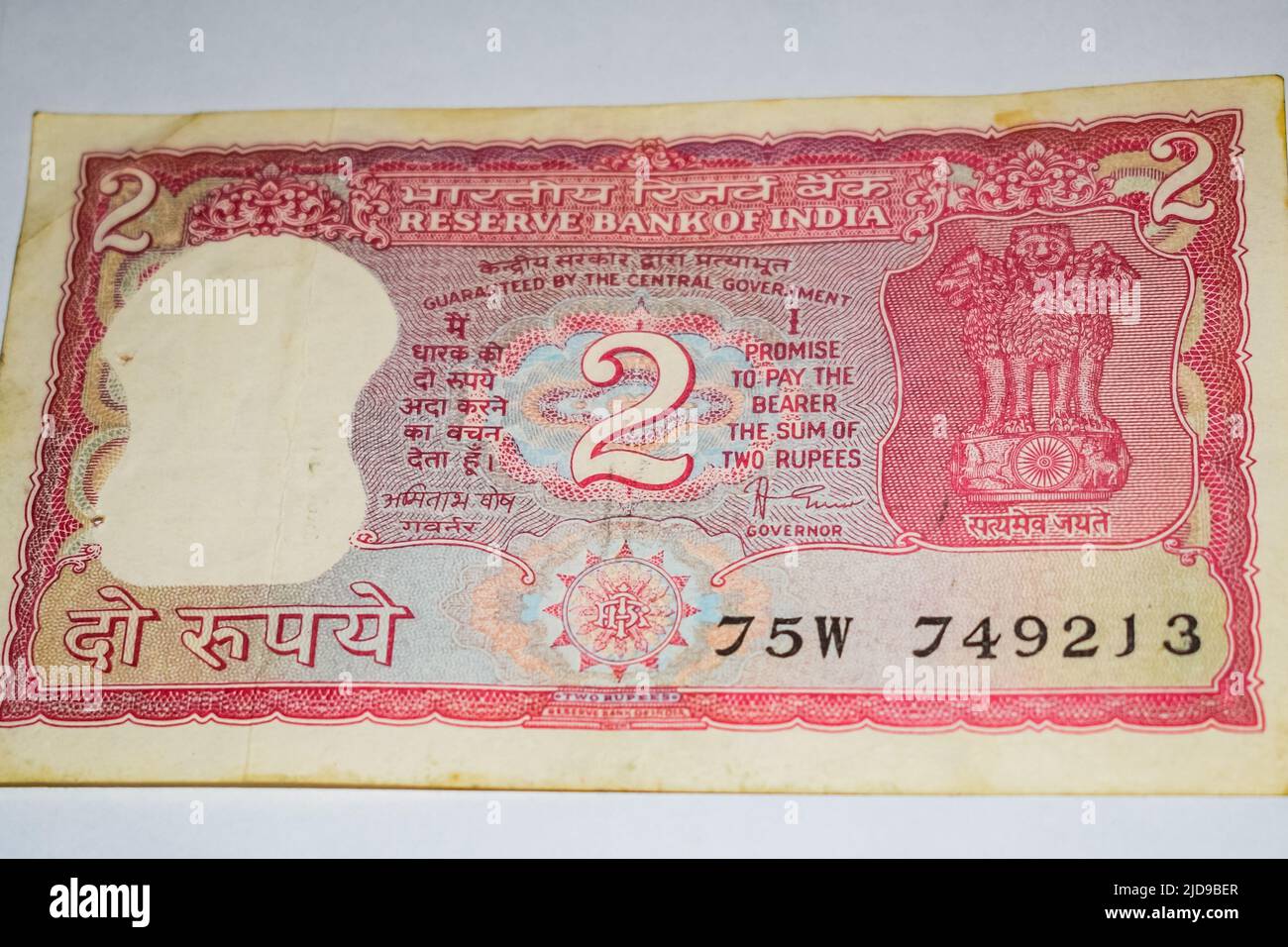 Old Two Rupee notes combined on the table, India money on the rotating ...