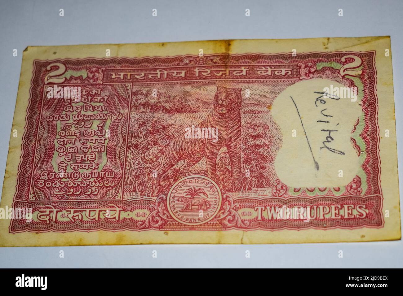Old Two Rupee notes combined on the table, India money on the rotating ...