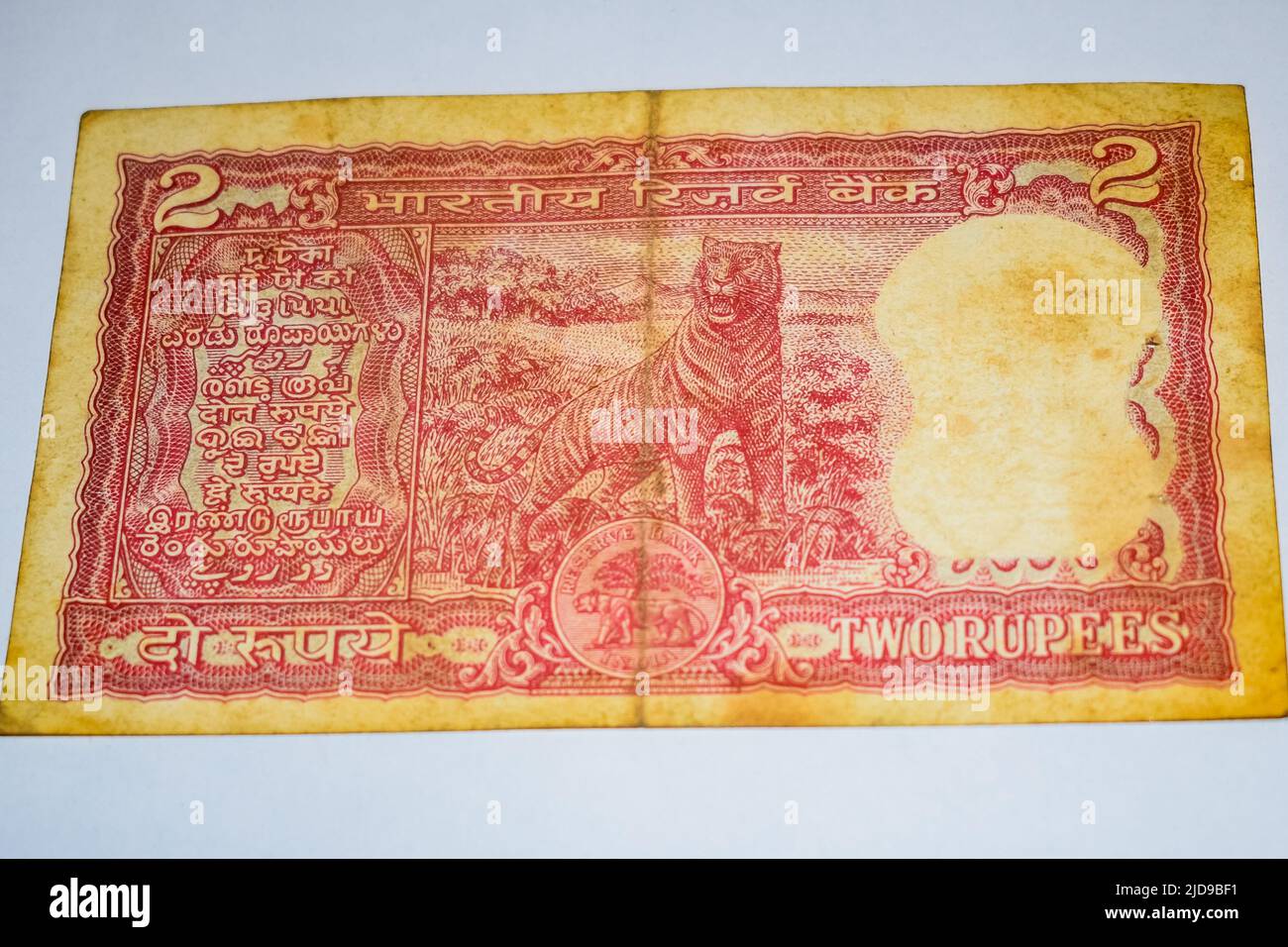 Old Two Rupee notes combined on the table, India money on the rotating ...