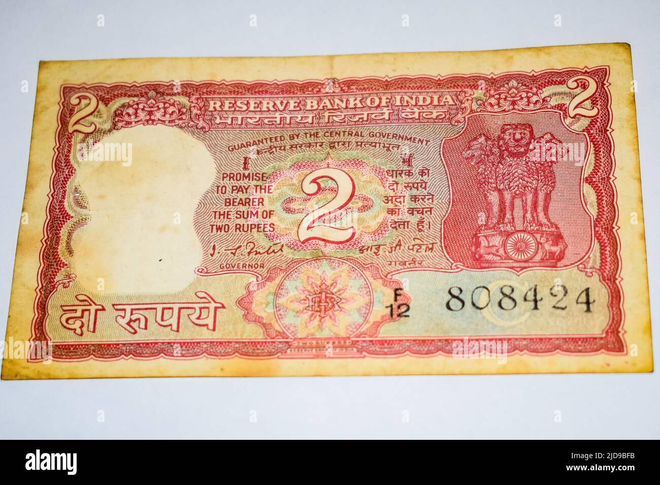 Old Two Rupee notes combined on the table, India money on the rotating ...