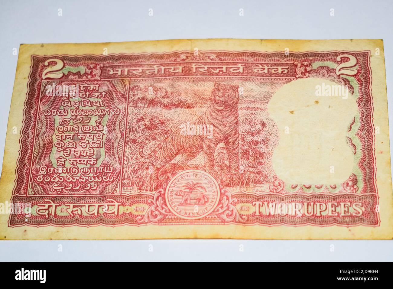 Old Two Rupee notes combined on the table, India money on the rotating ...