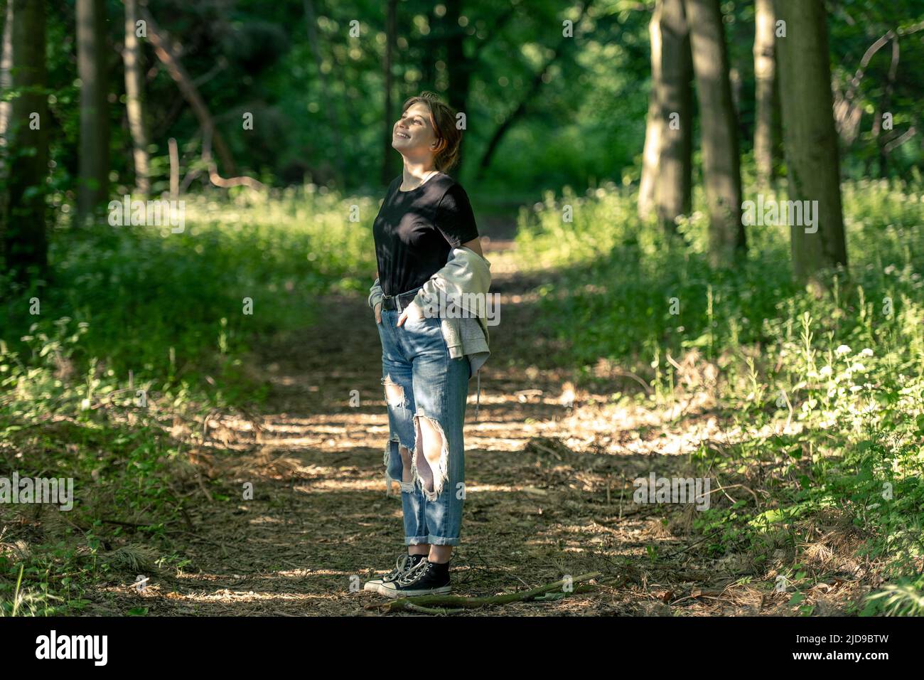 Pretty girl in field Stock Photo - Alamy