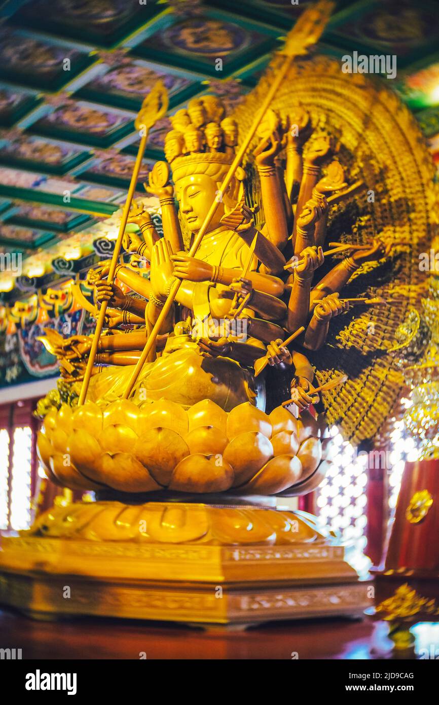 Guan yin lady chinese god wooden stute in religion temple Stock Photo ...