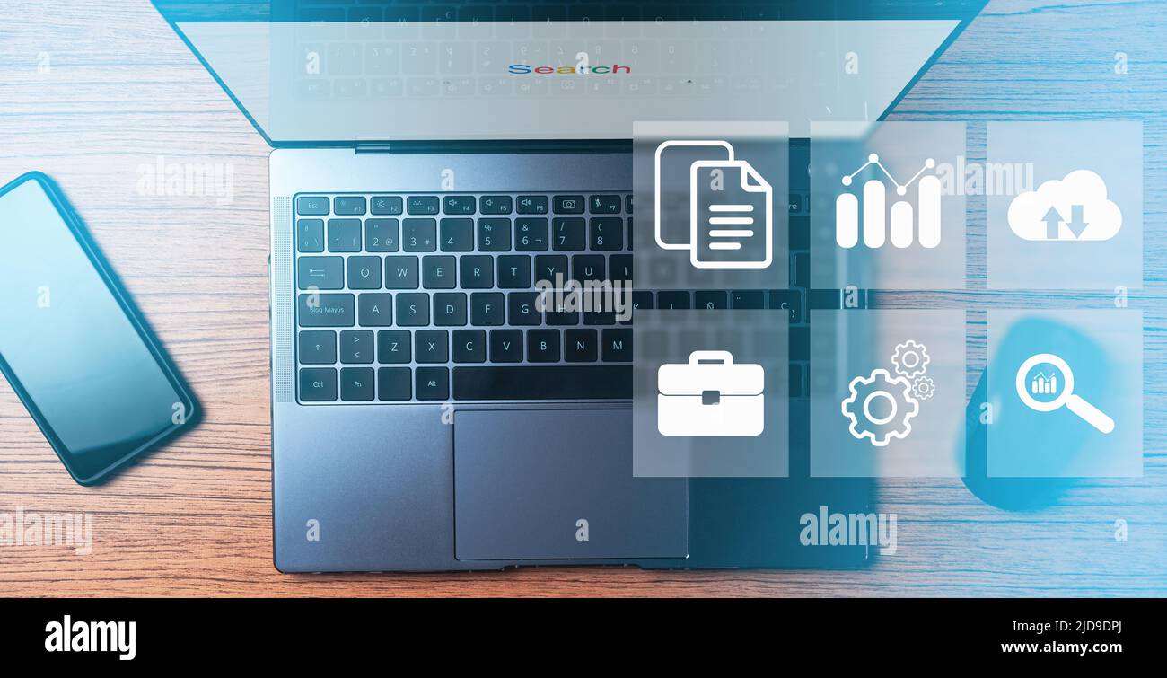 Desk top view with laptop, smartphone and mouse with digital ...