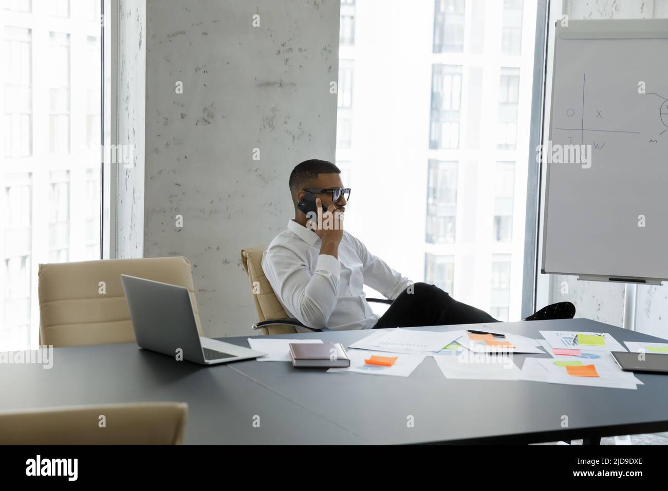 Successful businessman lead formal conversation by phone call at ...