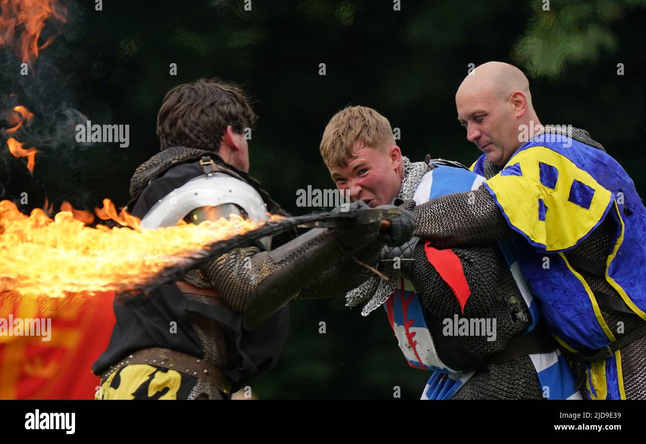 People dressed as the Knights of Nottingham do battle with flaming ...