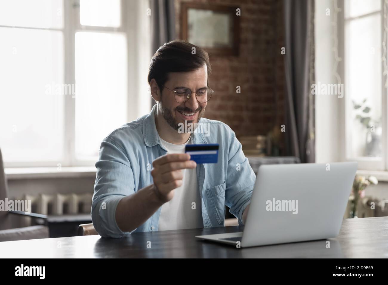 Man using bank card hi-res stock photography and images - Alamy