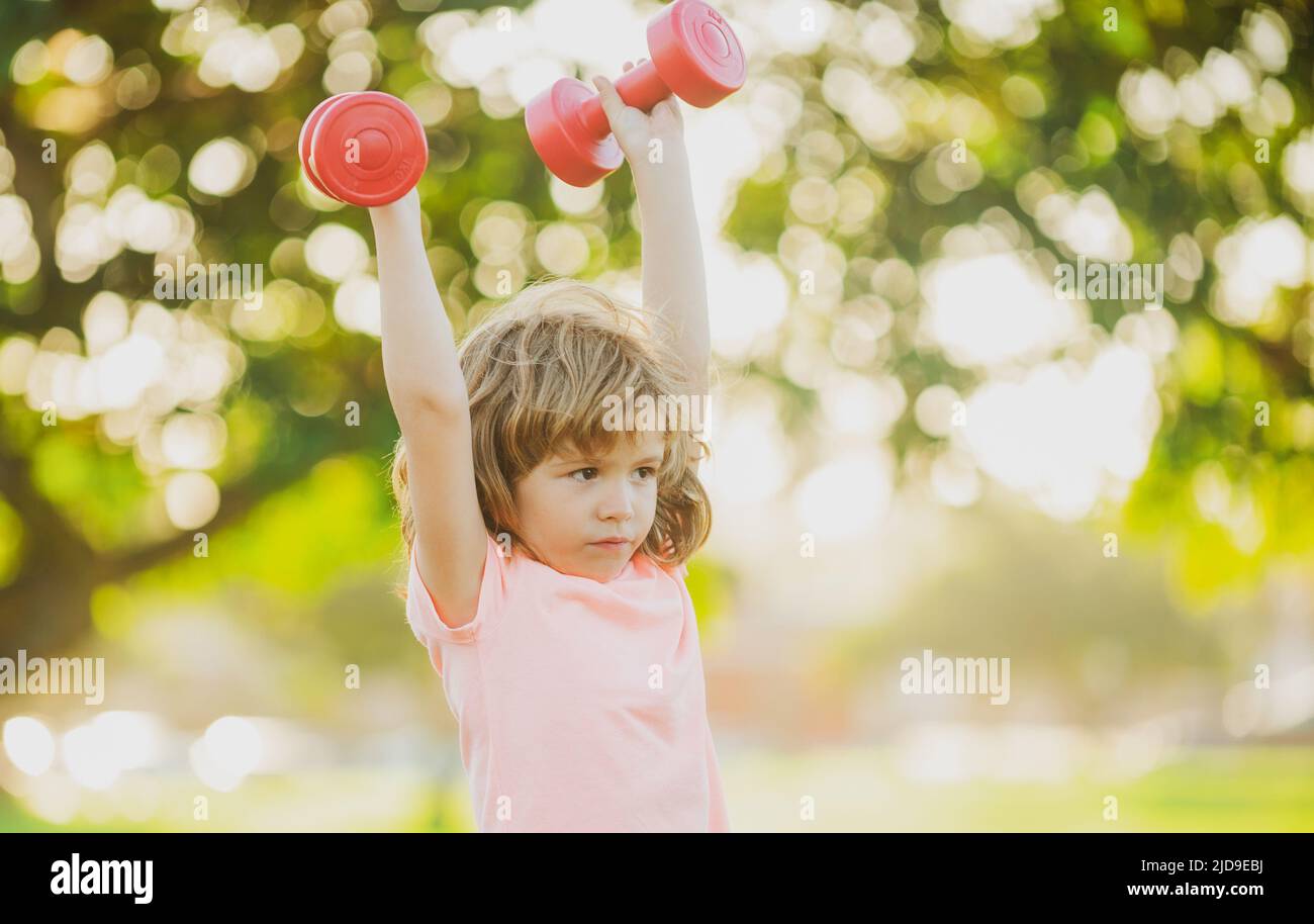 Kid boy exercising in park. Children healthy lifestyle. Sport child ...