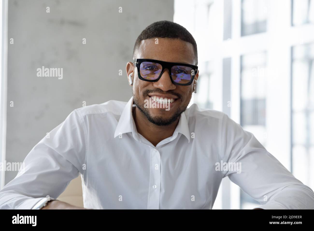 Headshot webcam portrait successful African businessman make video call ...