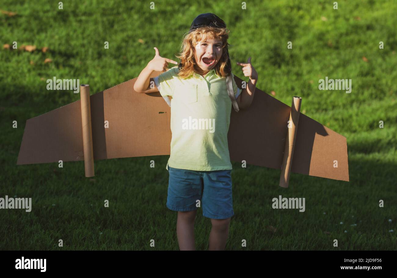 Child boy playing pilot on the sky blue background. Kid dreaming. Child ...