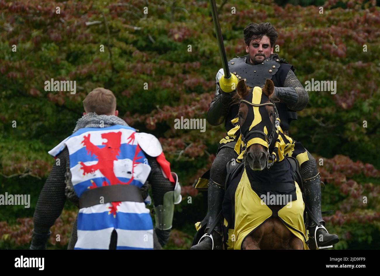 The Black Knight charges at Thomas of Rockingham as people dressed as ...