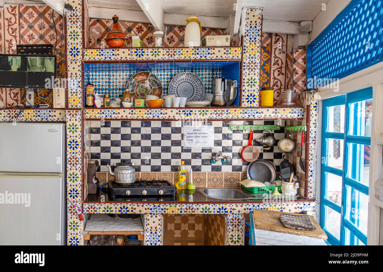 Kitchen space, tiled walls, traditional colorful ornaments in a house ...