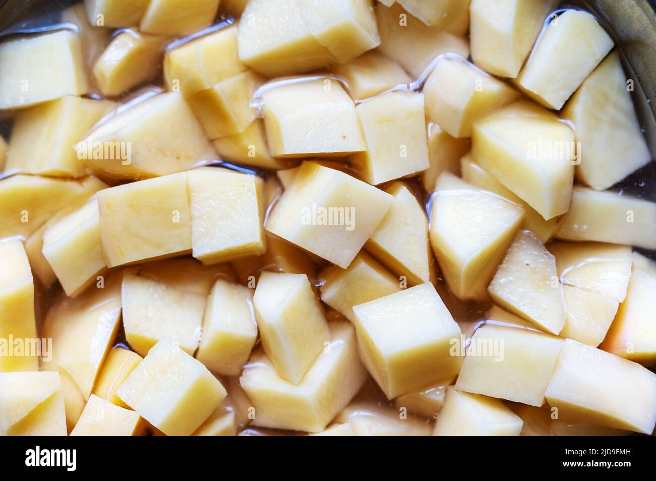 Full frame diced potatoes. Raw vegetable without peel. Healthy Eating ...
